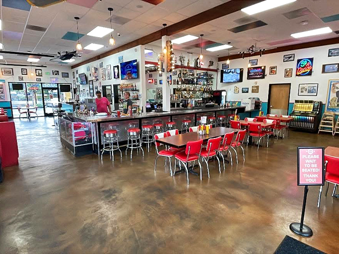 Classic red vinyl meets chrome in this time-traveling interior where calories don't count and nostalgia comes complimentary with every meal.