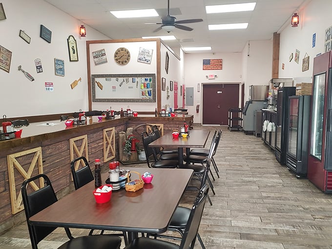 Simple surroundings let the food take center stage &ndash; red condiment caddies stand ready for action in this no-frills flavor factory.