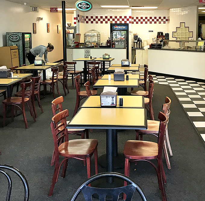 Classic black and white checkered floors set the stage for sandwich artistry&mdash;no fancy frills, just delicious fundamentals done right.