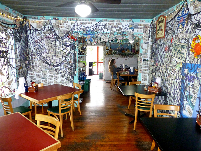 Fishing nets and dollar bills create the perfect maritime decor. No interior designer needed when you've got authentic Gulf Coast character.