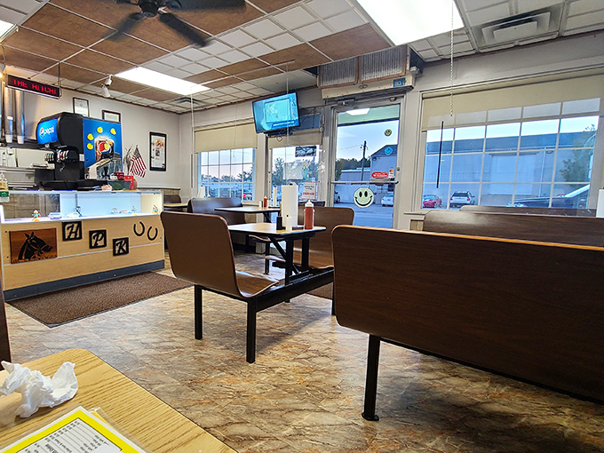 Inside, exposed brick walls and wooden chairs create that perfect "everybody knows your name" atmosphere where comfort food and conversation flow freely.