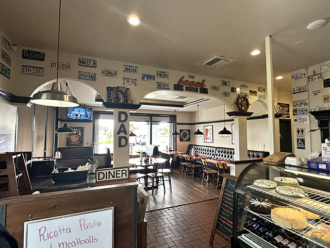 License plates from across America line the walls, telling stories of distant journeys while diners create new memories over plates of comfort food classics.