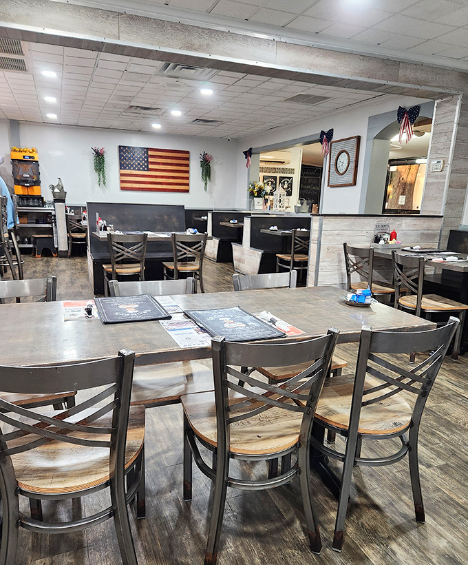 Patriotic decor and comfortable seating create that "everybody knows your name" vibe. The American flag watches over breakfast negotiations.