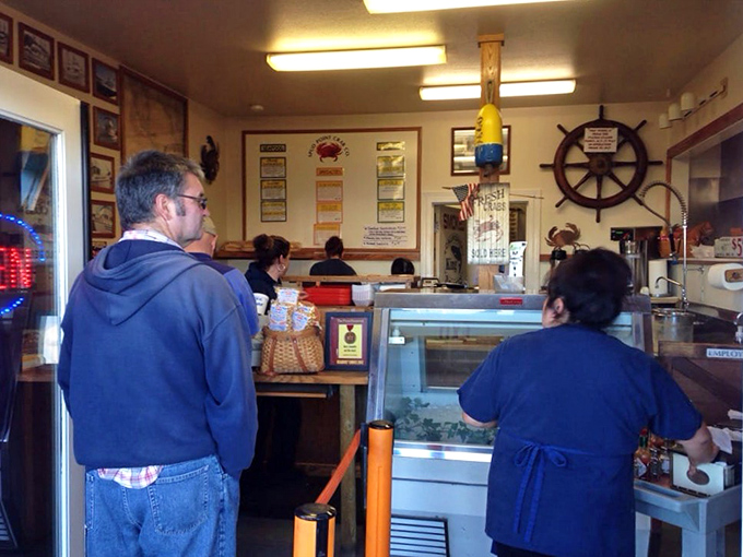 Sunlight streams through windows into a dining room where burgundy walls and wooden floors create the perfect backdrop for pie-induced euphoria.