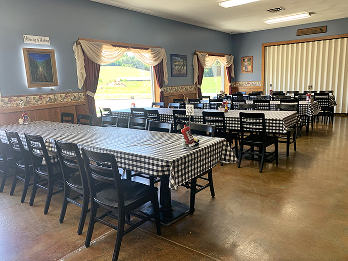 Classic black-and-white checkered tablecloths set the stage for culinary memories in a dining room where conversations flow as freely as the coffee.