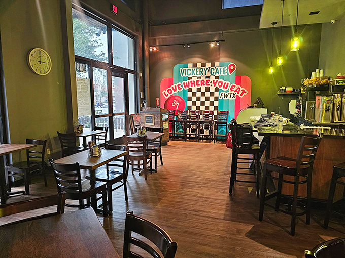 Inside Vickery Cafe, warm lighting, wooden tables, and colorful decor create a welcoming spot for hearty meals.