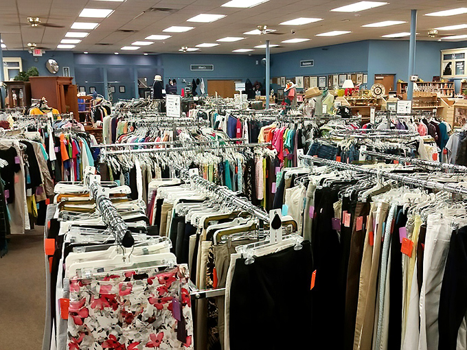 A textile ocean awaits exploration with neatly organized racks stretching toward the horizon. This isn't chaos&mdash;it's curated possibility.