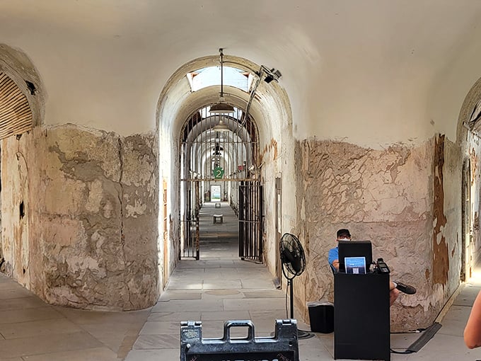 The haunting beauty of prison architecture on display&mdash;arched ceilings and crumbling walls create an atmosphere that's equal parts historical treasure and horror movie set.