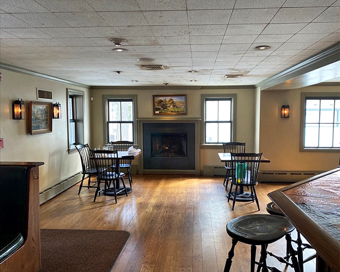 Cozy fireside dining where countless conversations have unfolded over plates of the tavern's legendary comfort food.
