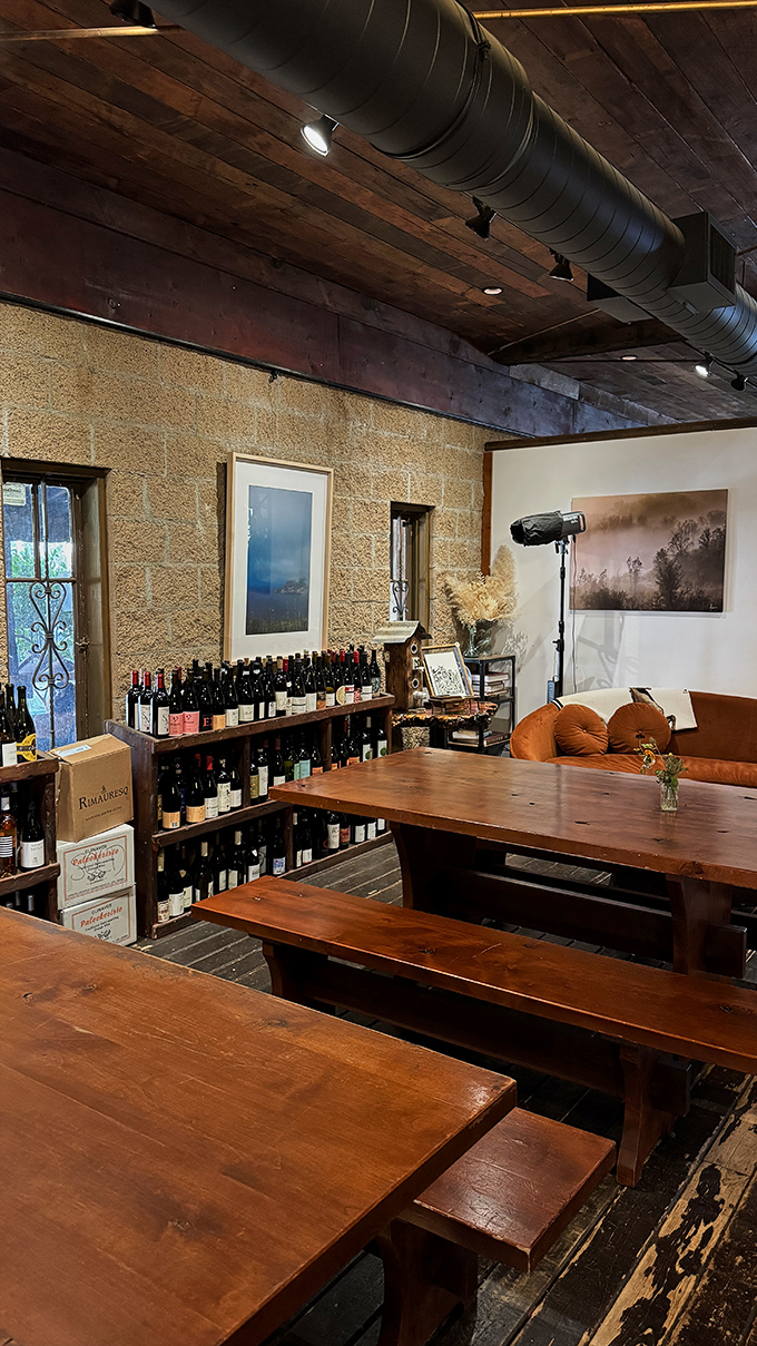 Rustic wooden tables and vintage chandeliers create an atmosphere where strangers become friends over perfectly grilled steaks.