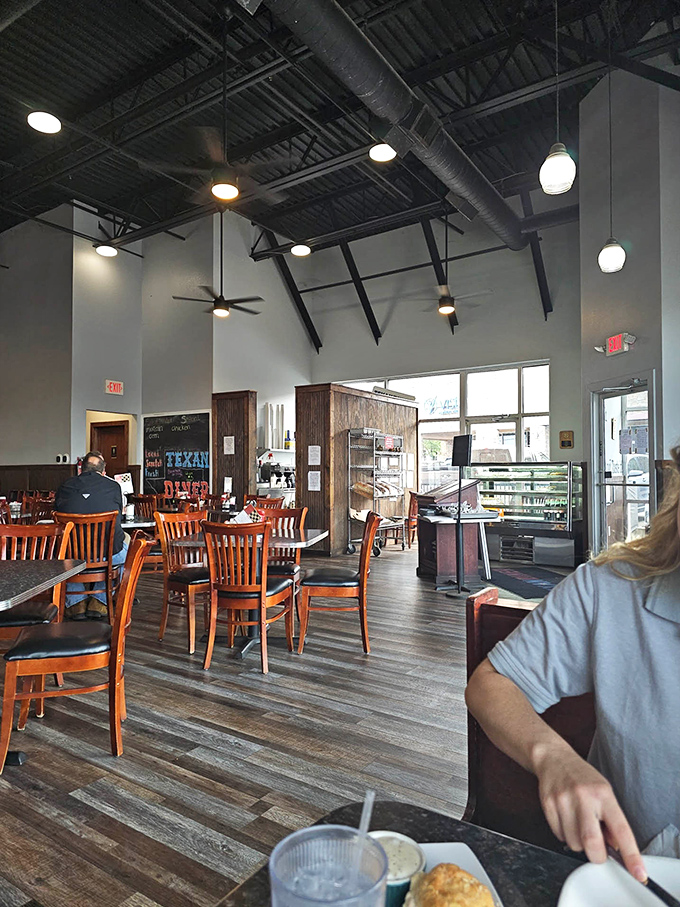 Inside, worn wooden floors and red wainscoting create that perfect "been here forever" vibe where strangers become friends and regulars hold court.