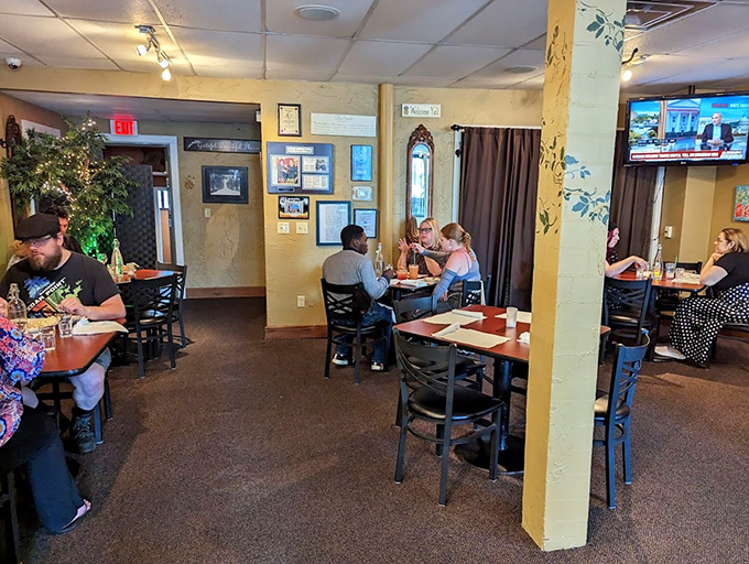 Yellow pillars and warm lighting create the perfect backdrop for conversations that flow as easily as the sweet tea.