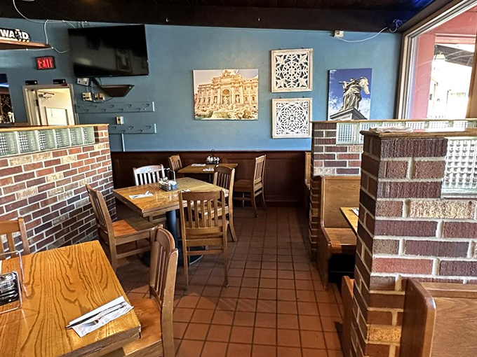 Blue walls and brick accents create that perfect "not too fancy, not too casual" vibe where both date nights and family dinners thrive.