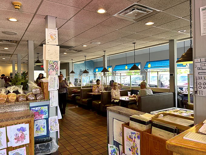 Classic diner ambiance meets hometown charm. Those children's drawings on display tell you everything about this restaurant's place in the community.