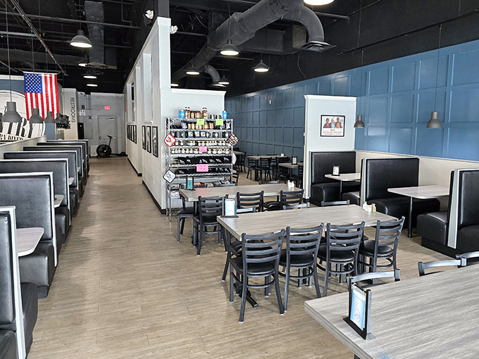 Clean lines, comfortable booths, and an American flag create that perfect balance of modern aesthetics and classic diner comfort. No pretension, just good vibes.