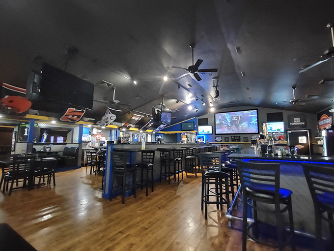 Inside, wooden floors and blue-trimmed accents create that perfect "Cheers" vibe where everybody might not know your name yet, but they soon will.