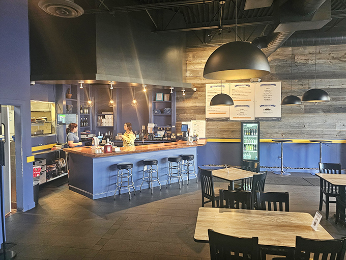 Modern minimalism meets comfort at Preston's interior. The blue and wood color scheme says "we're cool, but we're here for the food, not the fuss."