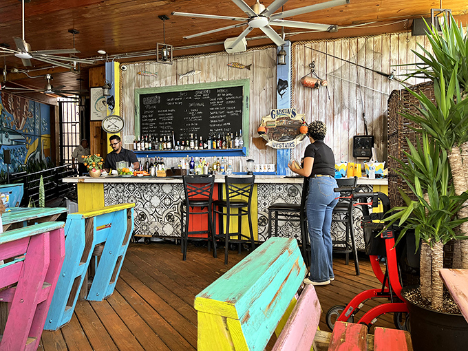 Where tropical colors meet maritime charm. Garcia's bar area feels like the galley of the coolest fishing boat that decided to drop anchor permanently.