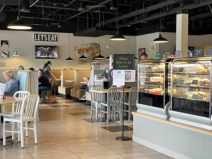 Inside, the "LET'S EAT" sign isn't just decoration&mdash;it's the most unnecessary instruction you'll ever receive once those aromas hit you.