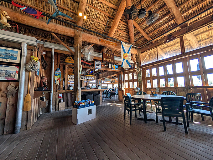 Step inside and time slows down. The rustic wooden beams and thatched ceiling create that perfect "no worries" atmosphere every beach restaurant aspires to achieve.