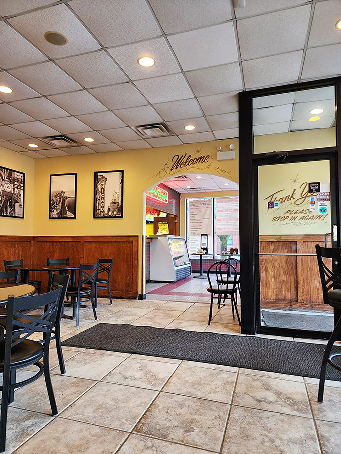 Yellow walls and classic Chicago photographs create that perfect neighborhood pizzeria vibe &ndash; comfortable enough to linger, casual enough to come as you are.