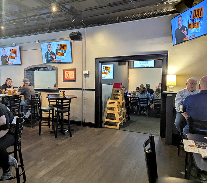 Inside Bennett's, the warm wood floors and multiple TVs create that perfect "third place" where sports fans and food lovers unite in delicious harmony.