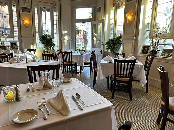 Crisp white tablecloths, elegant place settings, and sunlight streaming through tall windows create the kind of dining room where memories are made and pasta dreams come true.