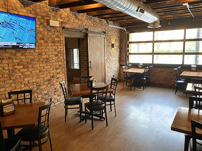 Exposed brick, wooden beams, and that sliding barn door &ndash; Offset's interior feels like the coolest friend's loft apartment, if that friend happened to be a barbecue genius.