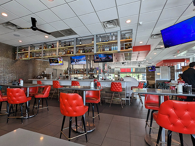Red tufted bar stools invite patrons to perch and ponder life's big questions—like whether to order pancakes or waffles. Why not both?