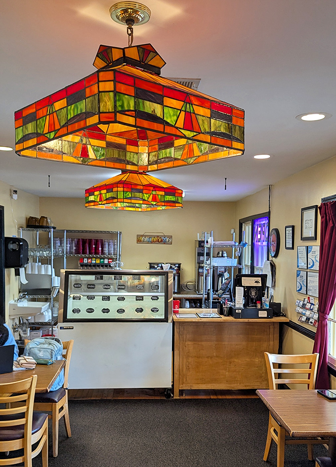 These colorful stained-glass light fixtures aren't just illuminating the room&mdash;they're setting the stage for the comfort food theater about to unfold.