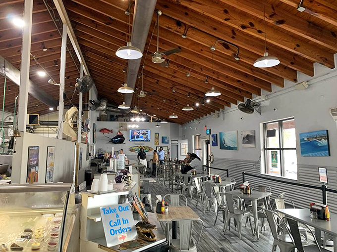 Wooden ceiling beams and nautical decor create that perfect "I've discovered something authentic" vibe. The kind of place where paper napkins are a badge of honor.