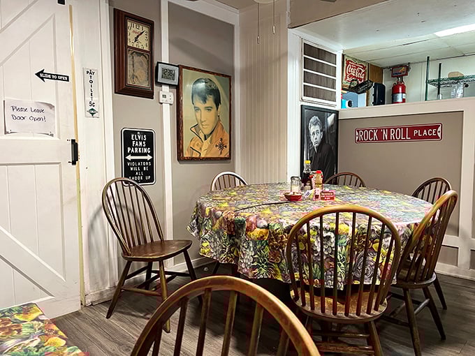 Elvis watches over diners from his place of honor. The "Rock 'N Roll Place" sign isn't kidding around.