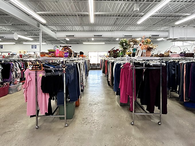 Clothing racks stretch toward the horizon like a textile Grand Canyon. Somewhere in this organized chaos lies your next favorite outfit.