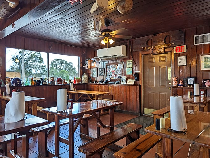 Wood-paneled walls, picnic-style tables, and paper towel rolls standing at attention&mdash;this is barbecue's natural habitat, no pretense required.