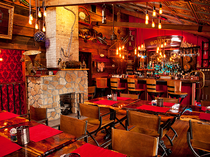 Rustic meets refined in this warm interior where Edison bulbs cast a glow that makes everyone look like they've just returned from vacation.