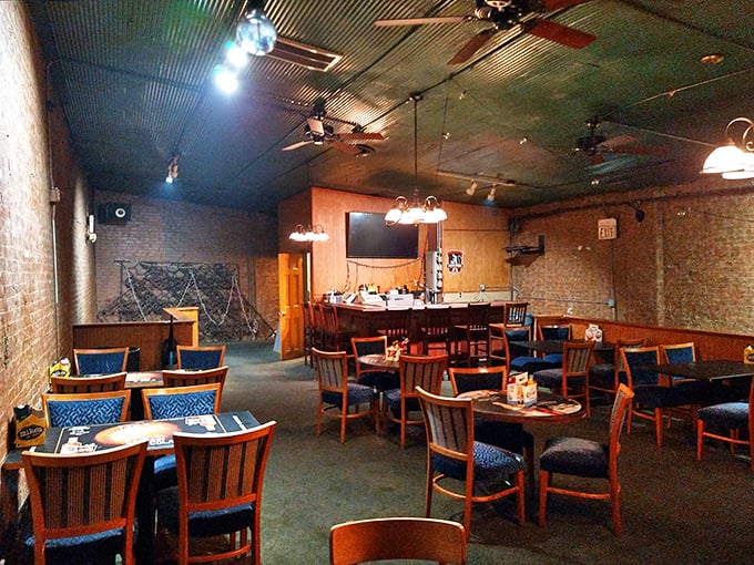Inside, the cozy dining room offers respite from Cleveland's hustle. Those blue chairs have supported countless happy diners in burger bliss.