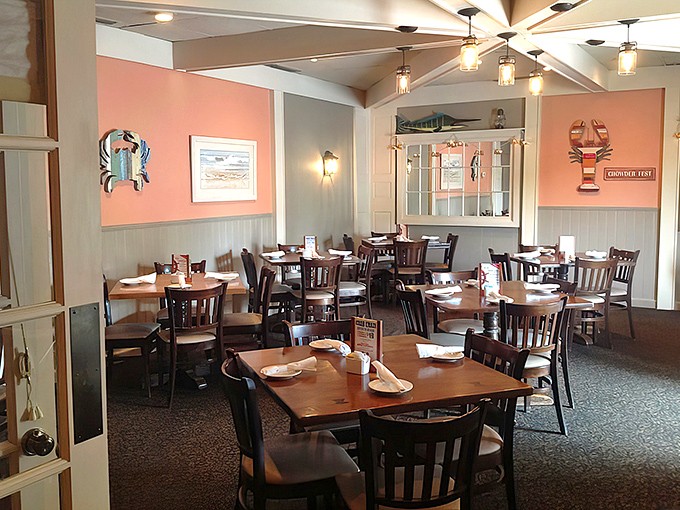 Coral walls, nautical accents, and wooden tables create that perfect "just caught this morning" atmosphere where conversations flow as easily as the chowder.