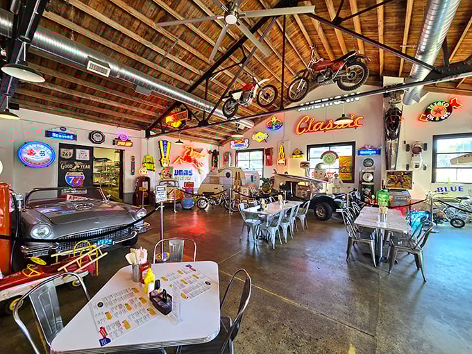 Vintage motorcycles suspended from wooden rafters and classic cars parked indoors? This isn't just a diner&mdash;it's an automotive museum that happens to serve incredible food.