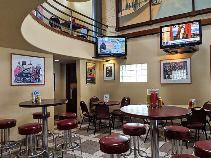 A circular balcony overlooks the dining area, creating an unexpected architectural surprise inside this Madison gem where comfort food meets comfortable atmosphere.