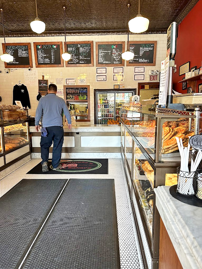 Step inside and time stands still. The vintage interior with its classic display cases and chalkboard menus promises authentic flavors ahead.