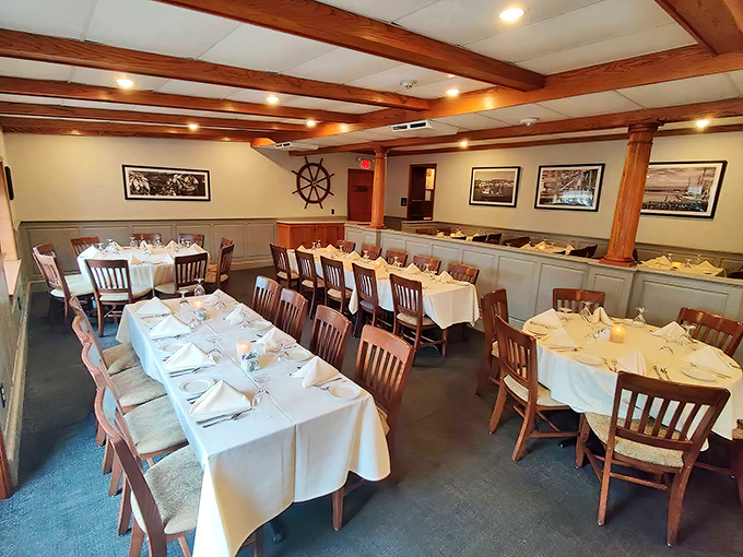 Nautical touches and exposed wooden beams create a dining room that feels like a first-class cabin on a very delicious voyage.