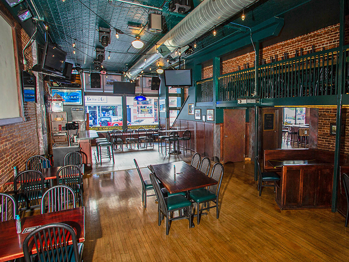 Step inside to find that perfect sports bar sweet spot—exposed brick walls, wooden floors, and enough TVs to catch every Packers play without feeling like you're in an electronics store.