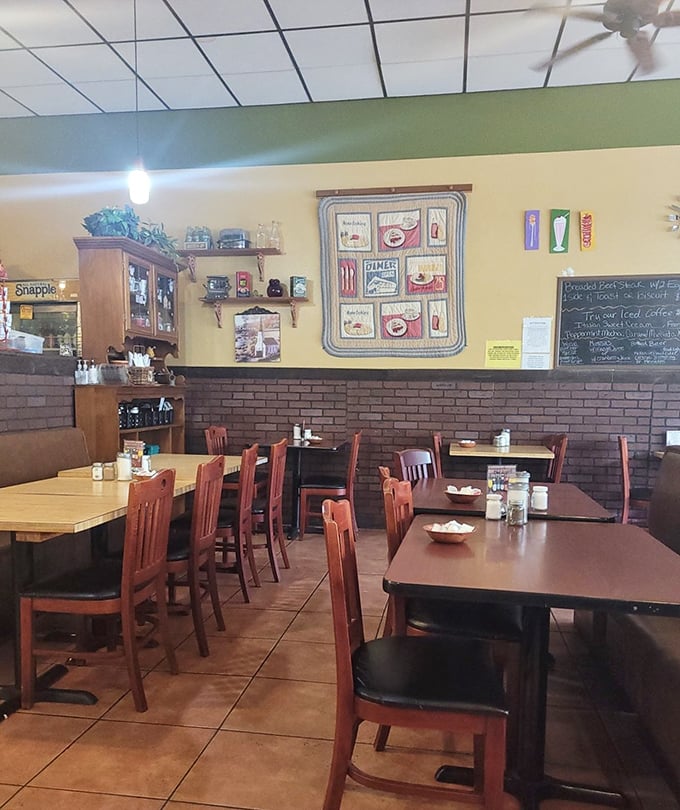 Classic wooden chairs, brick accents, and that quilted wall hanging—diners don't get more authentically old-school than this cozy Florida gem.