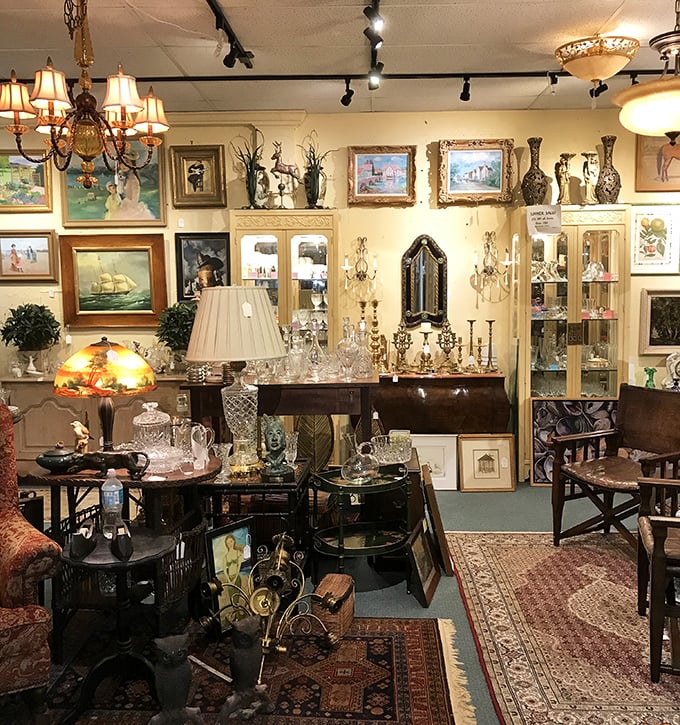 Elegance awaits in this meticulously arranged booth where crystal chandeliers cast dancing light across Persian rugs and gilded frames &ndash; Marie Antoinette would approve.