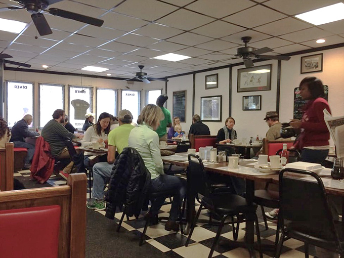 Where strangers become neighbors and neighbors become friends. The checkered floor isn't just decoration—it's a chessboard where breakfast strategy happens.