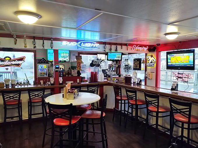 Where everybody knows your name &ndash; or will by dessert. The bar's neon glow and cozy seating invite lingering conversations over cold drinks.