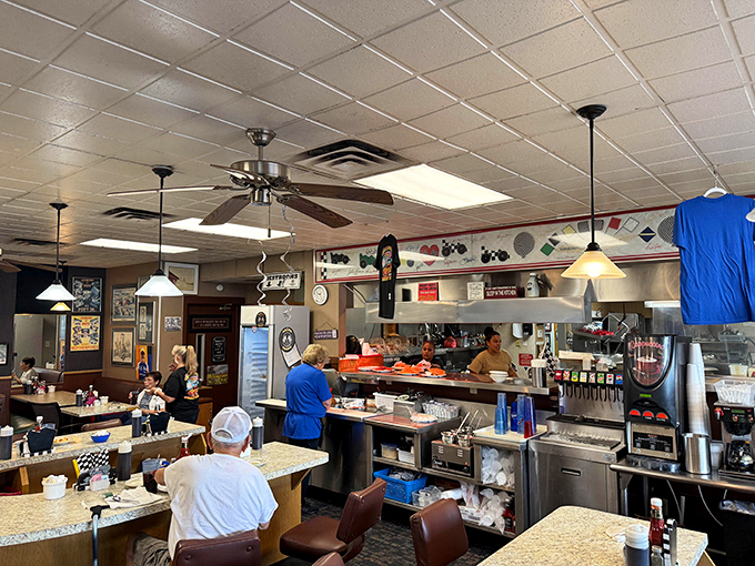 Inside Charlie Browns, the open kitchen isn't just functional&mdash;it's dinner theater where pancake flipping becomes an art form worth the price of admission.