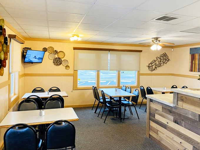 Simple tables, warm colors, and minimal decor&mdash;this dining room lets the food take center stage without distraction.