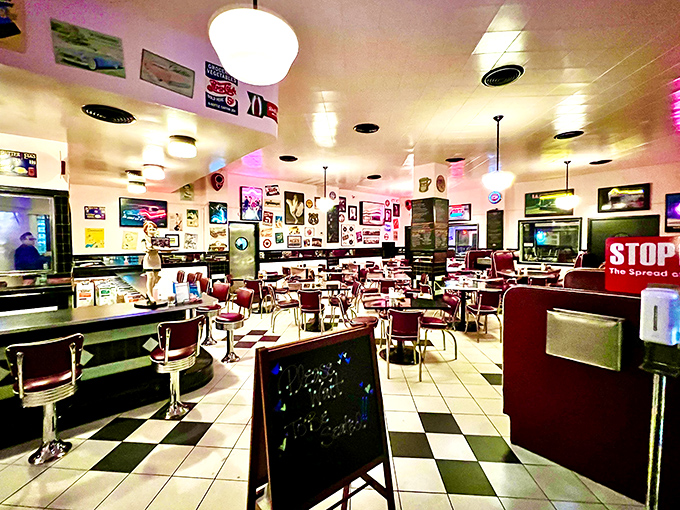 Step inside and the nostalgia hits harder than your grandmother's hug &ndash; checkered floors, red vinyl booths, and walls plastered with memories of simpler times.