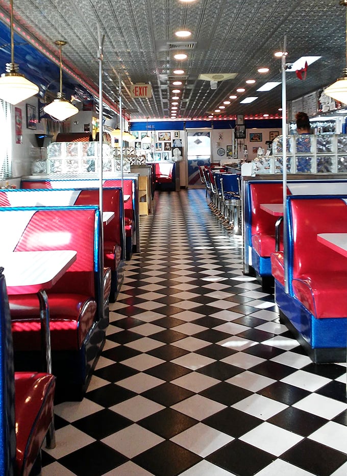 Classic Americana flows through every inch of this diner, from the checkerboard floor to the red vinyl booths that have cradled countless conversations.
